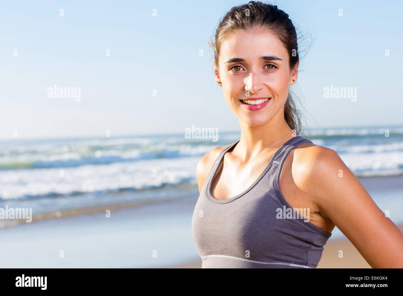 pretty fit woman portrait at beach in the morning Stock Photo - Alamy