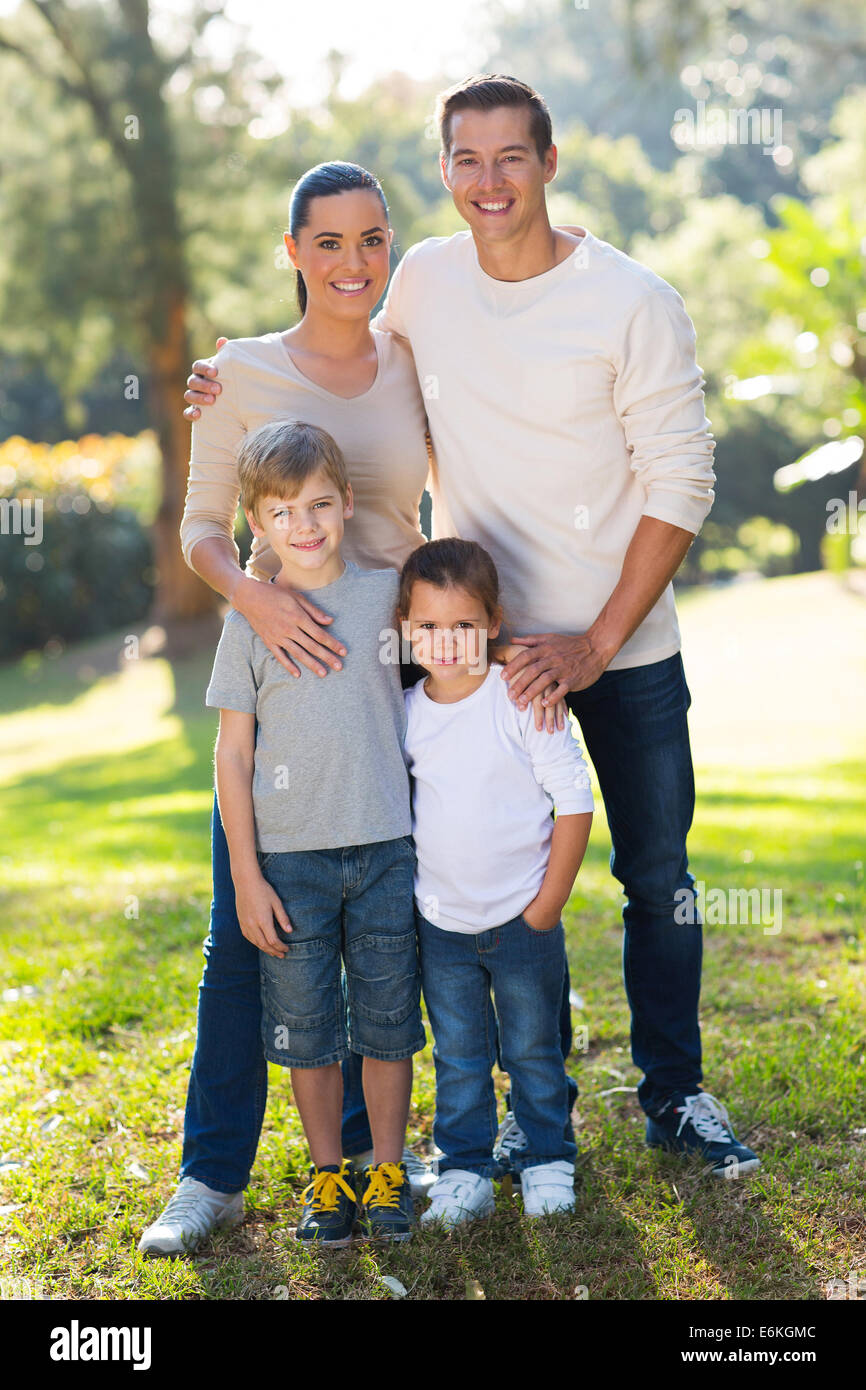 beautiful young family portrait outdoors in park Stock Photo - Alamy
