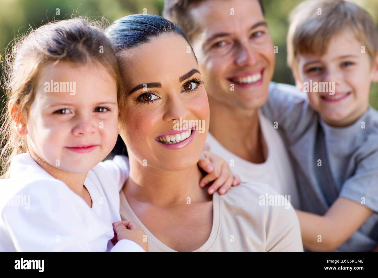 happy family closeup portrait outdoors Stock Photo - Alamy