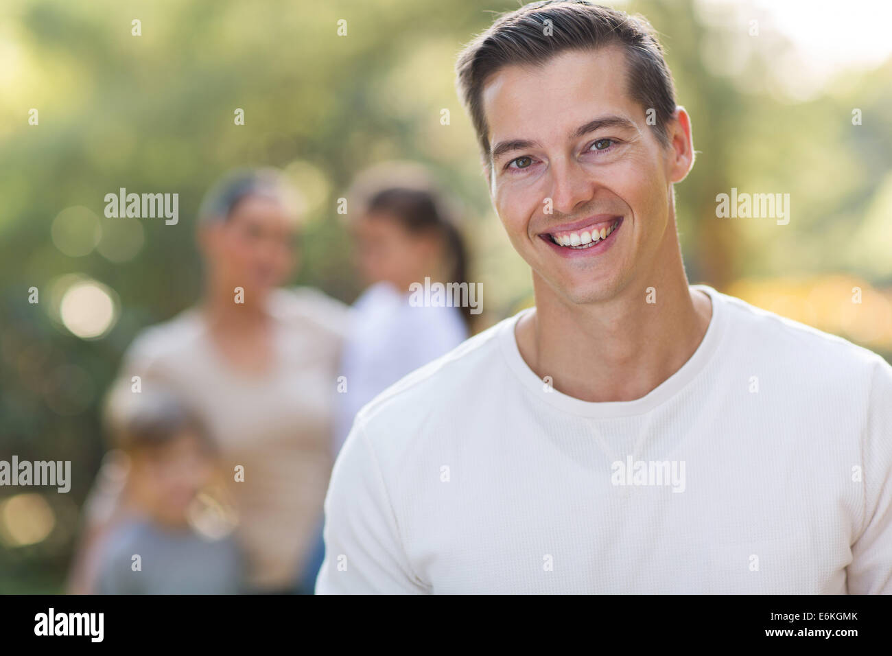 Handsome young family hi-res stock photography and images - Alamy
