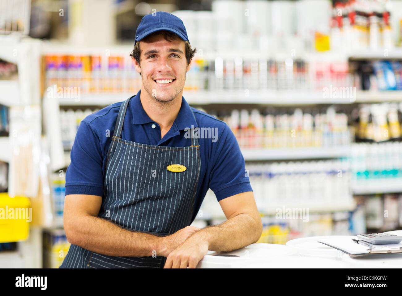 handsome hardware store worker looking at the camera Stock Photo - Alamy
