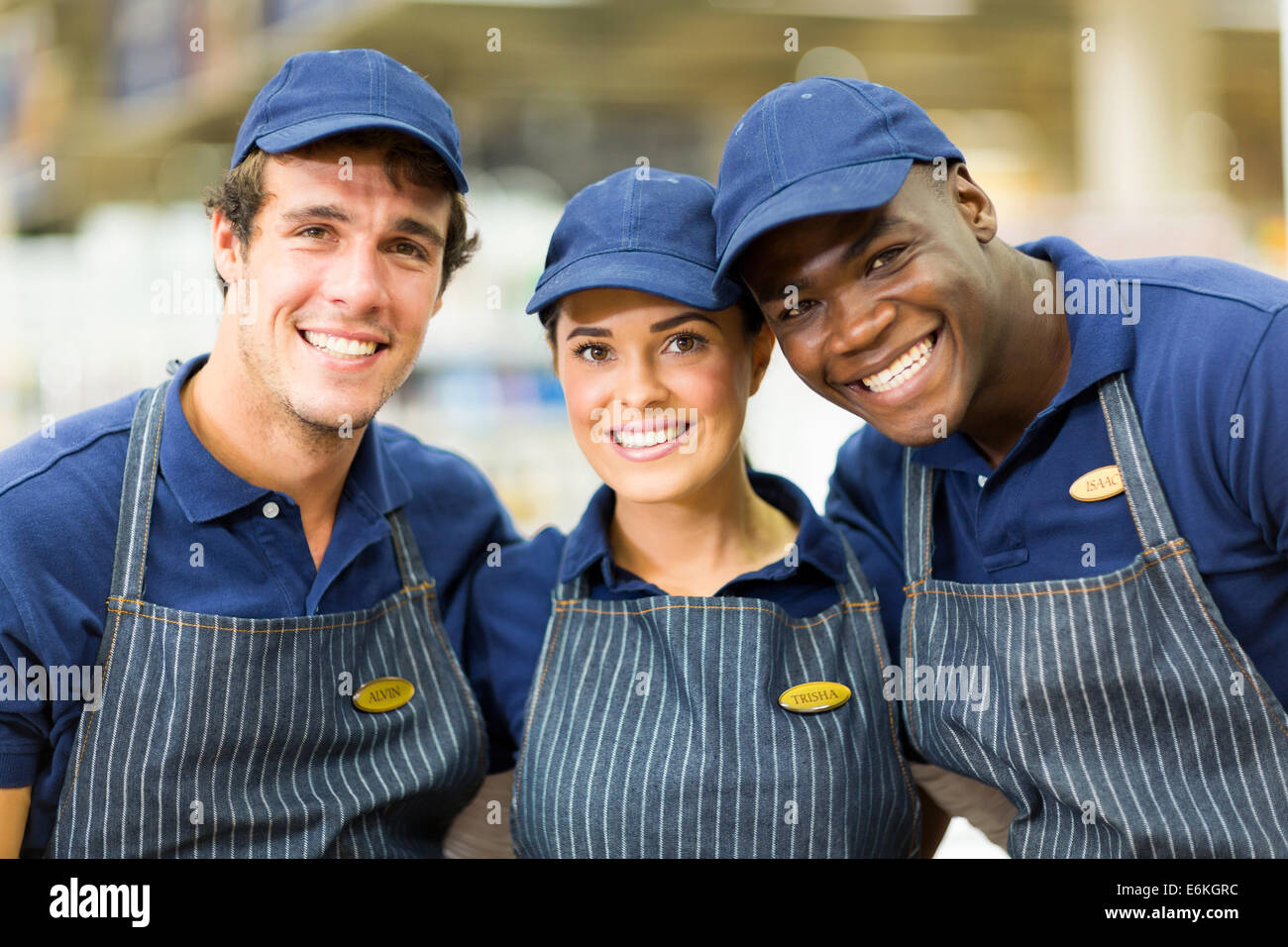 Group happy hardware shop workers hi-res stock photography and images ...