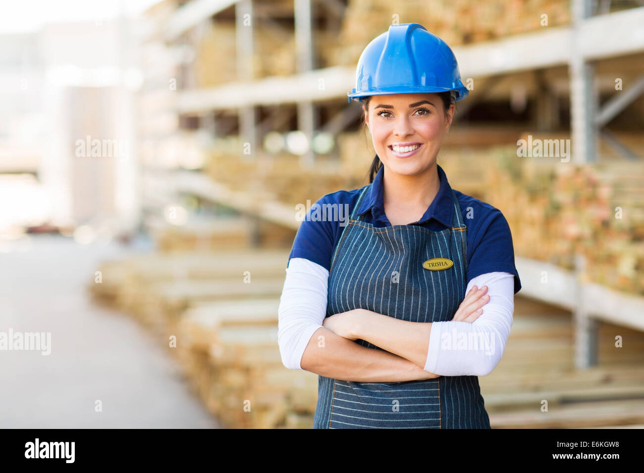 Portrait female warehouse standing arms hi-res stock photography and ...