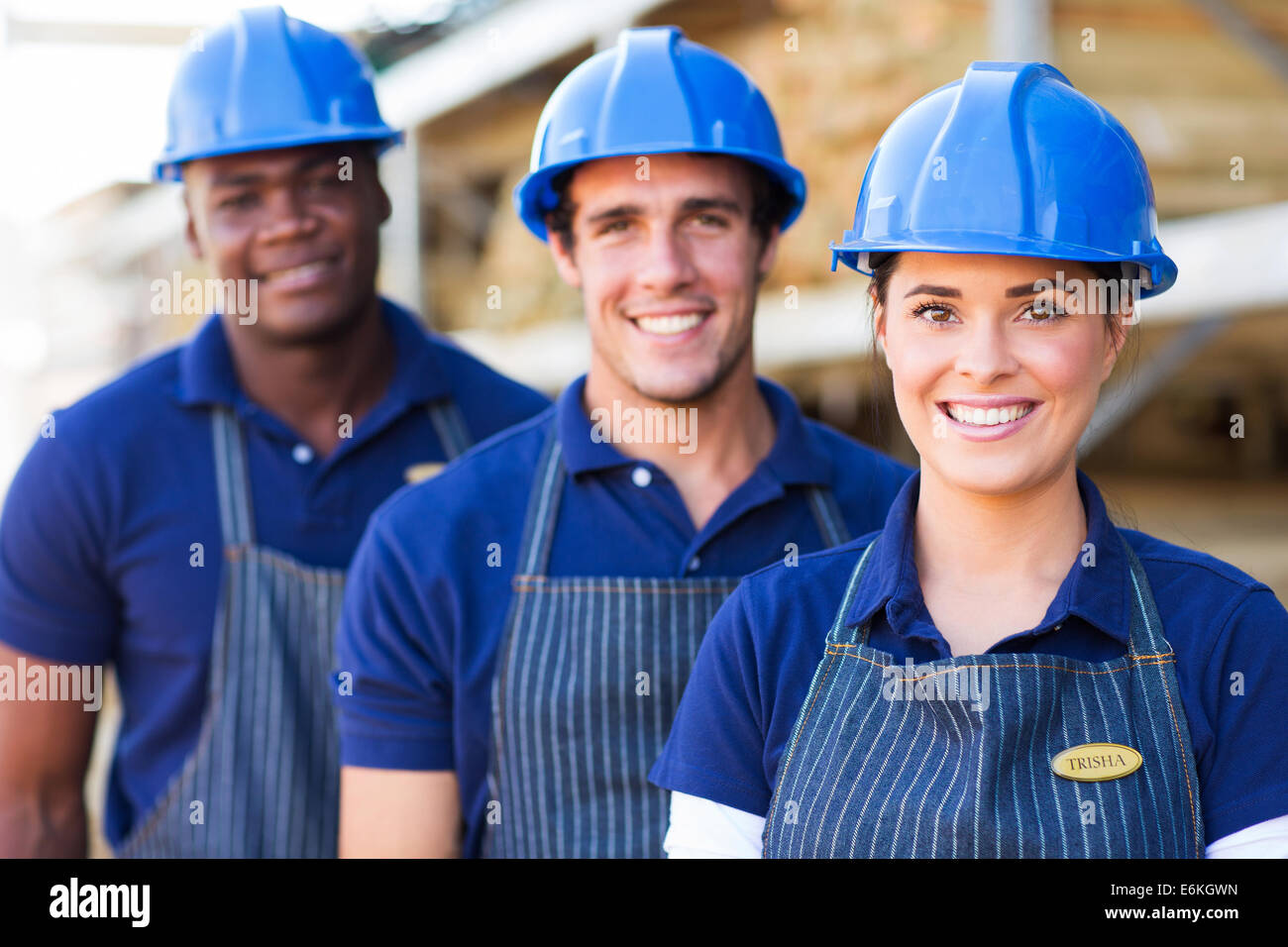 group of happy building material warehouse workers Stock Photo - Alamy