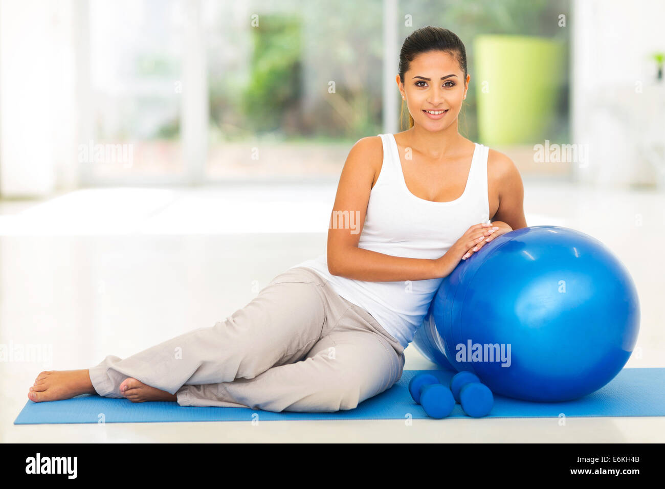 Woman relaxing at gym hi-res stock photography and images - Alamy