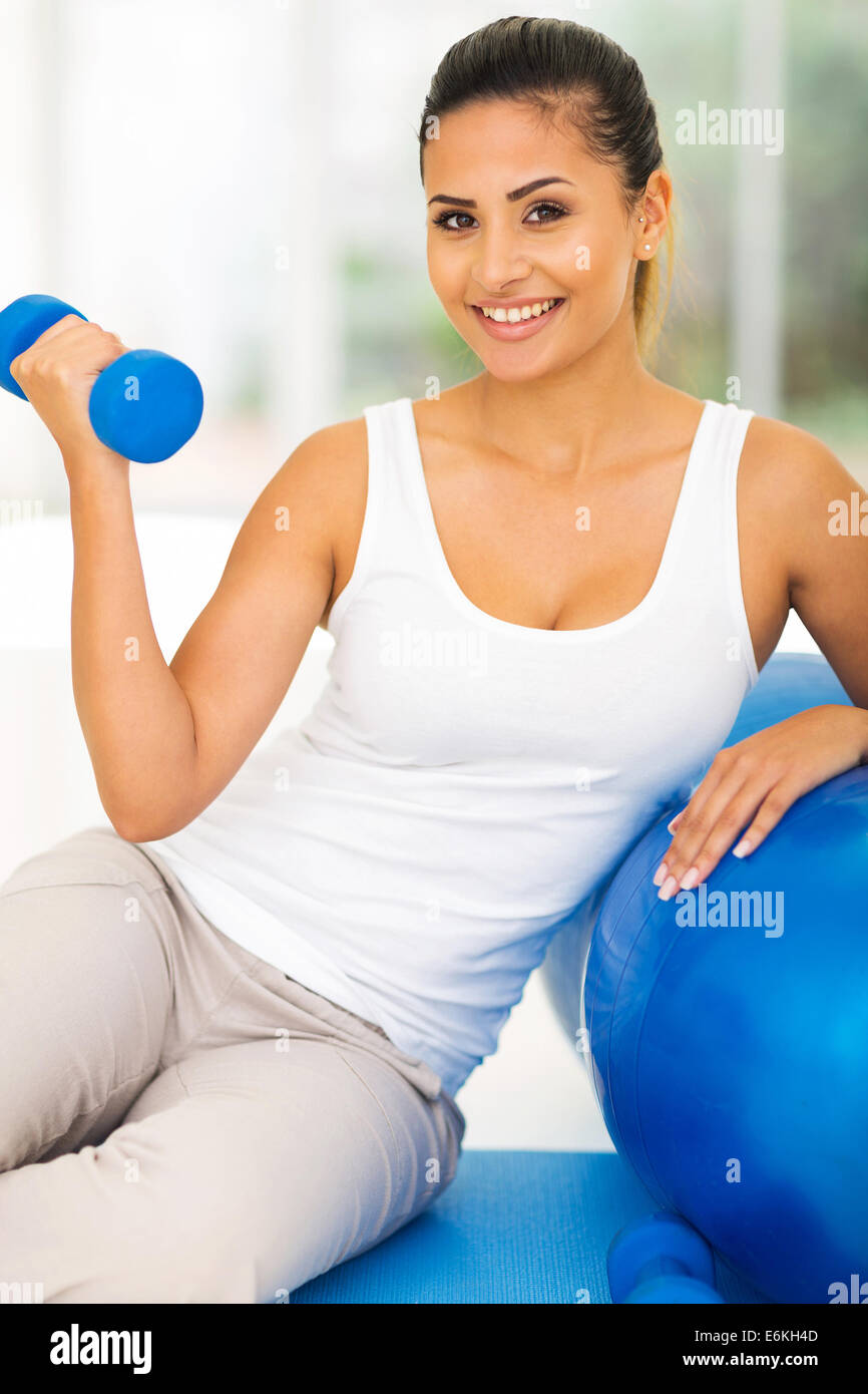 happy young woman doing fitness exercise at home Stock Photo - Alamy