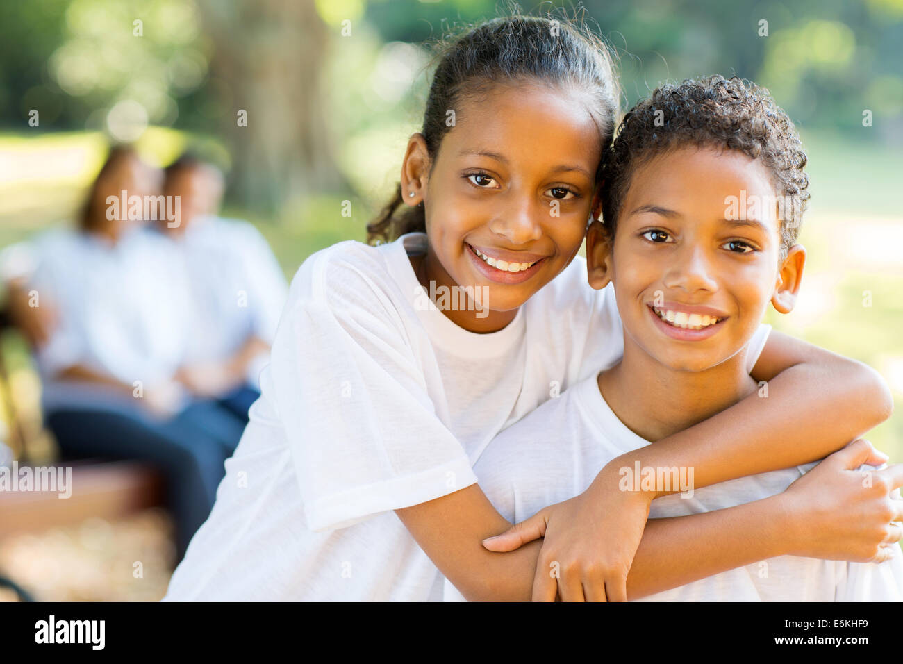 Older Brother And Sister Hugging