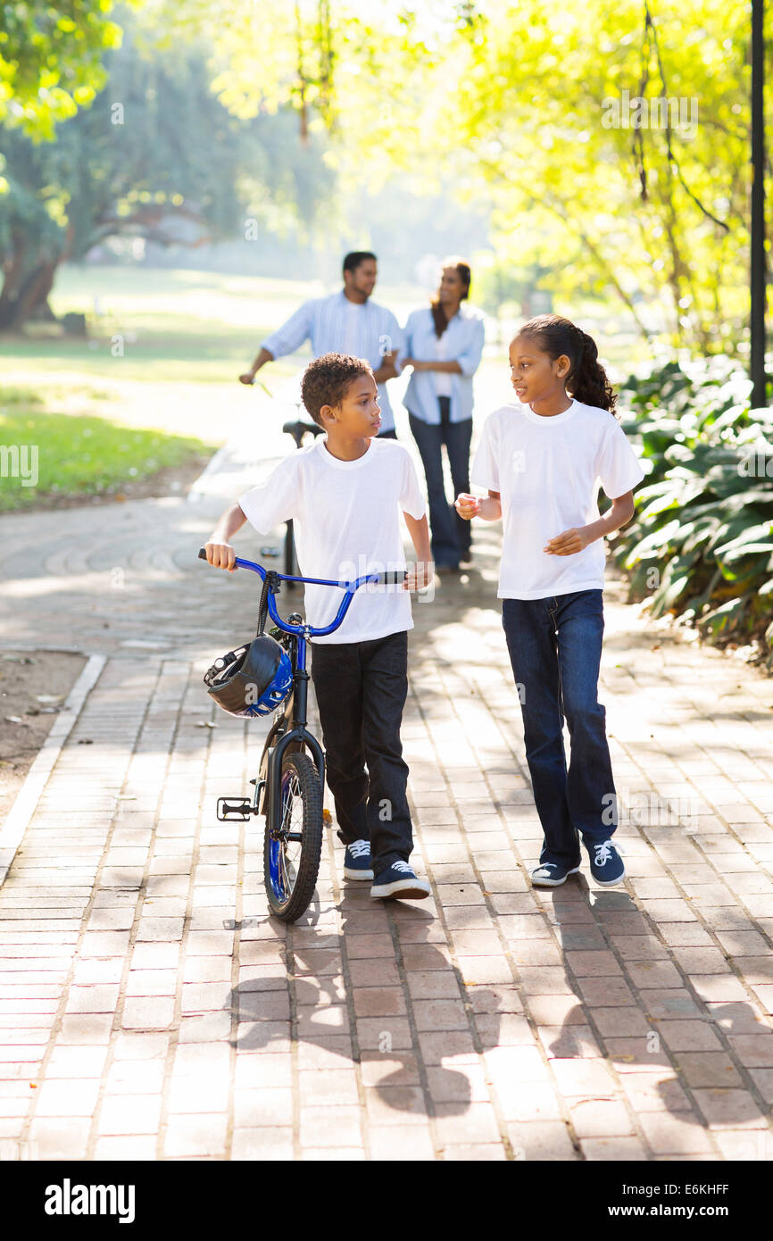 kids and parents walking outdoors at the park Stock Photo - Alamy
