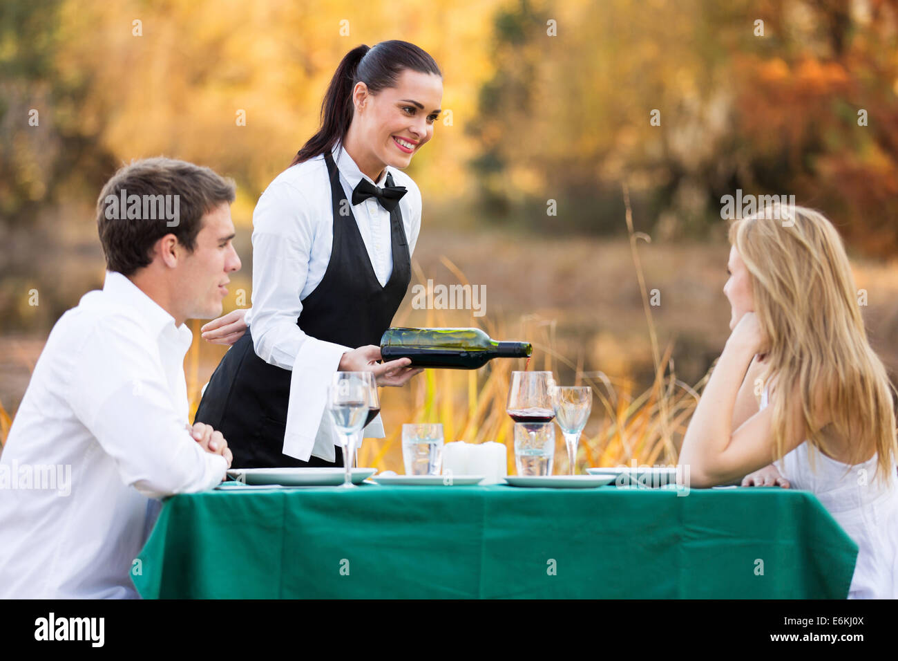 Waitress Serving Wine