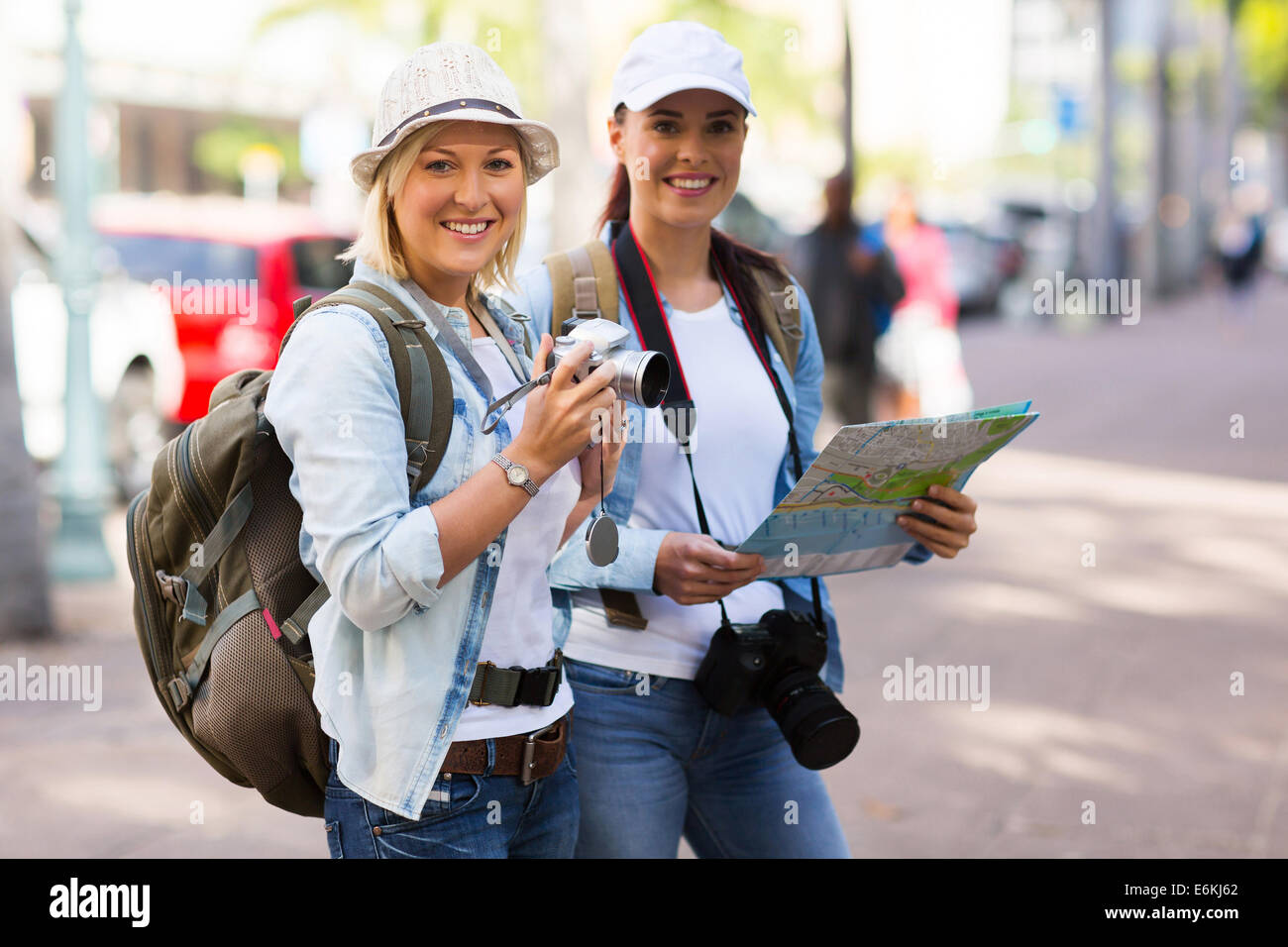 two happy tourist touring in town Stock Photo - Alamy