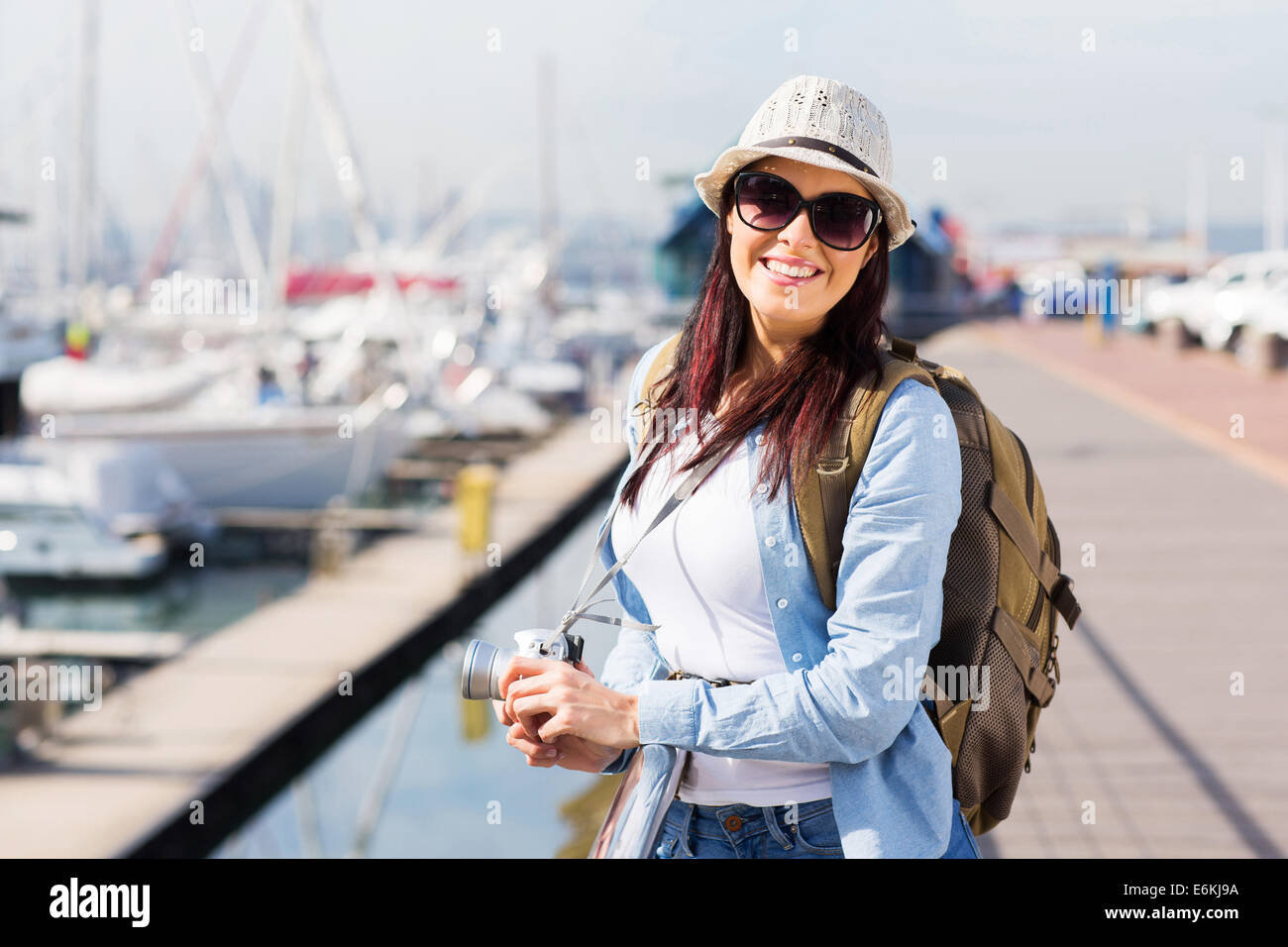 portrait of female tourist at the harbour Stock Photo - Alamy