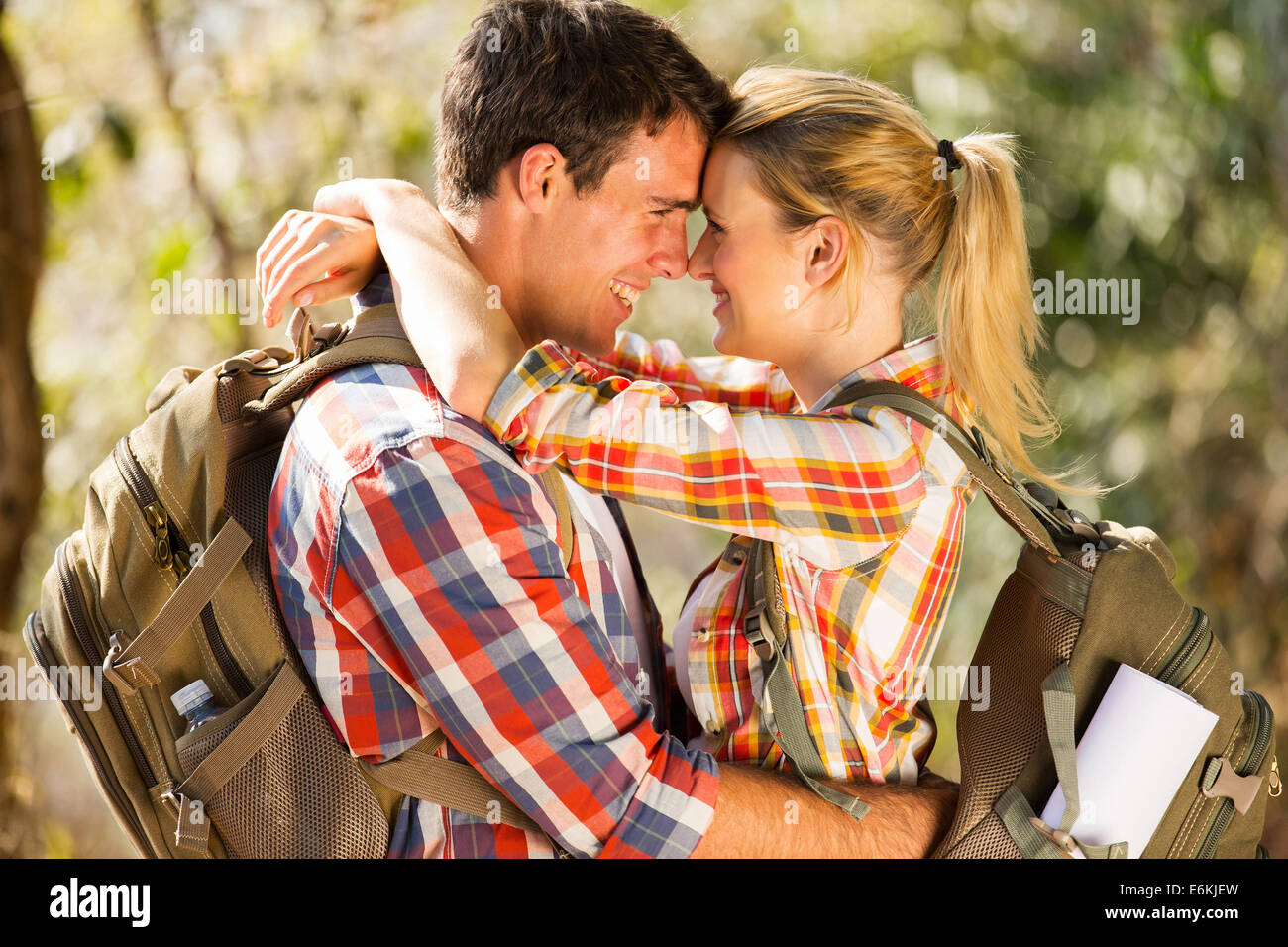 romantic young couple hiking in mountain together Stock Photo - Alamy