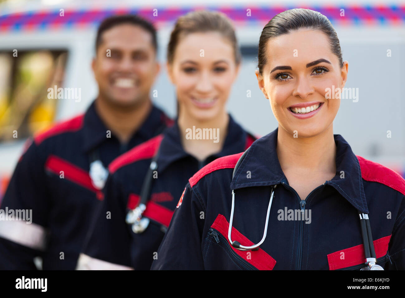 confident young paramedic team in front of ambulance Stock Photo - Alamy