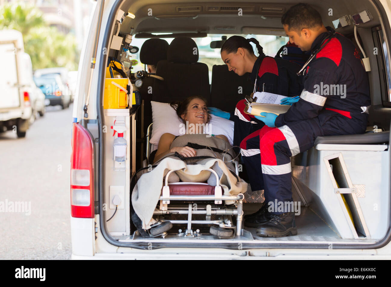 Friendly paramedic team talking hi-res stock photography and images - Alamy