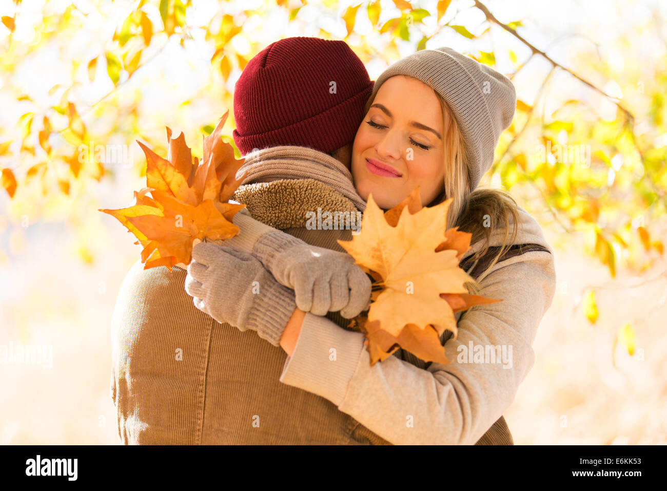 Young man hugging trees forest hi-res stock photography and images - Alamy