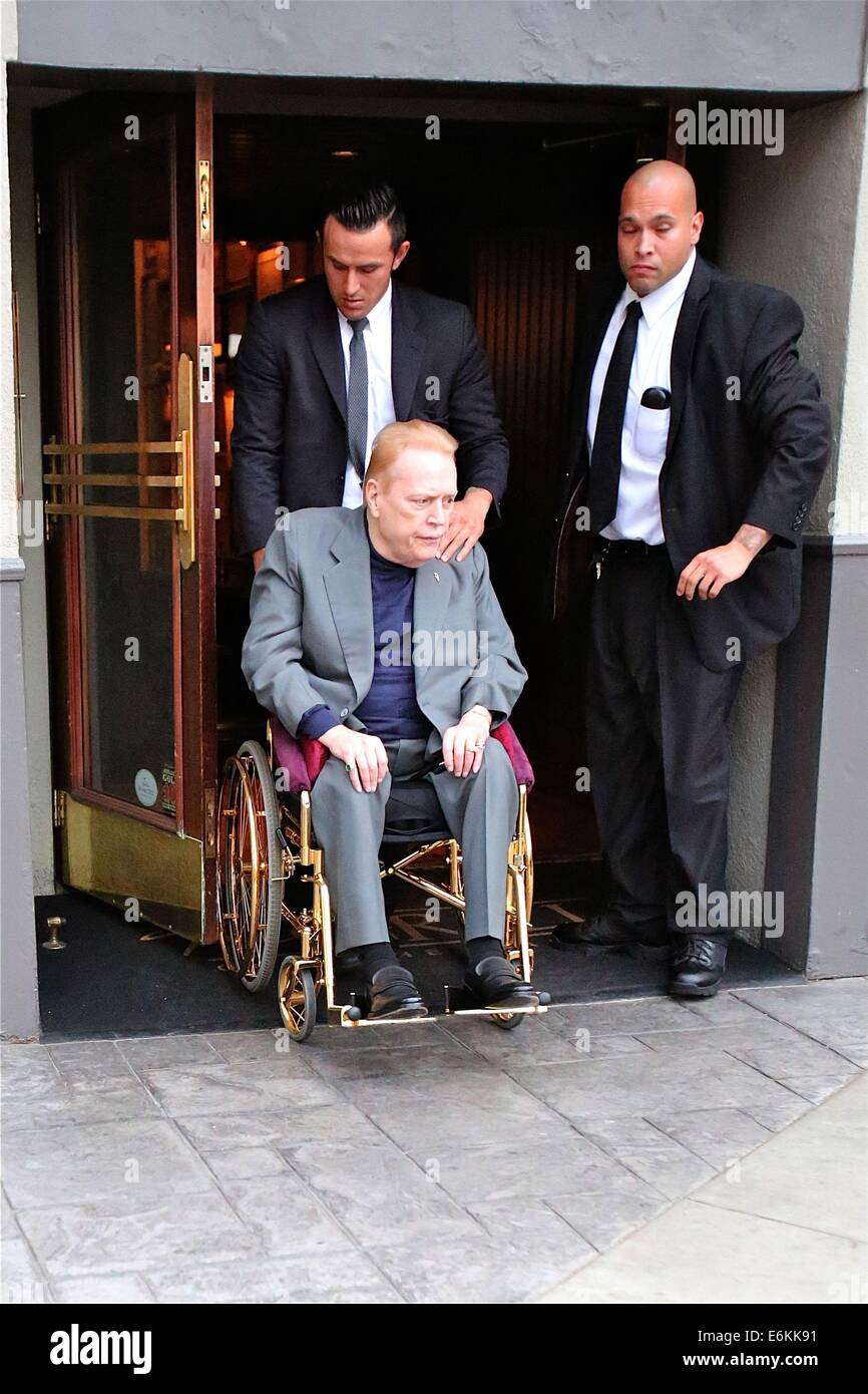 Larry Flynt leaves The Grill in Beverly Hills in his gold plated ...