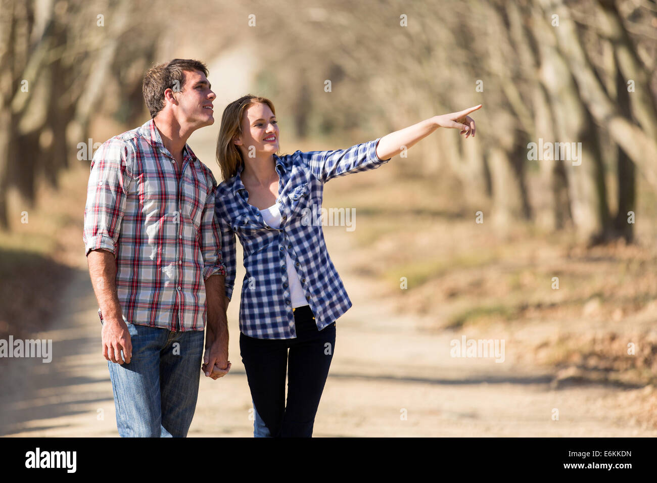 happy couple bird watching outdoors in fall Stock Photo - Alamy