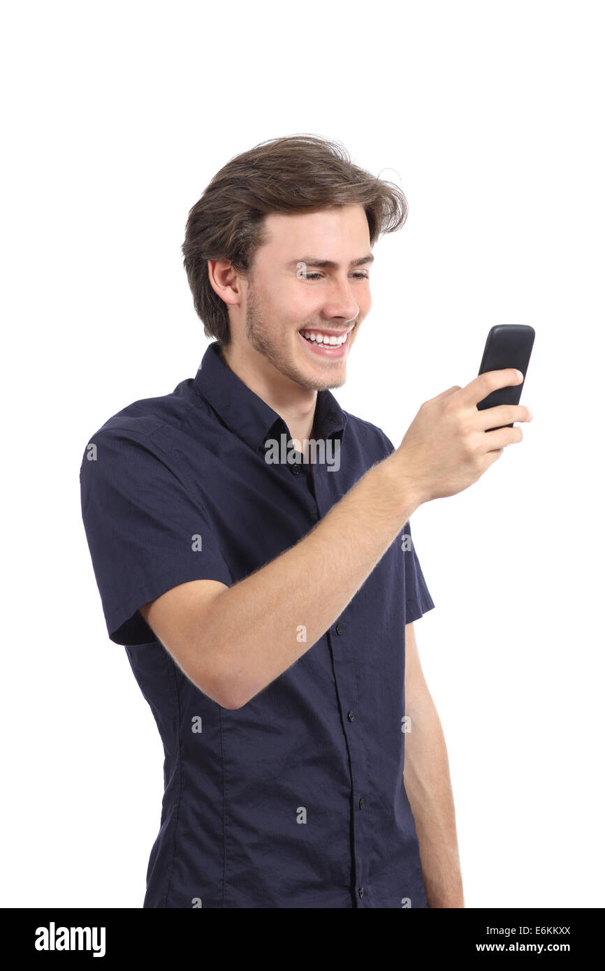 Funny man laughing using a smart phone isolated on a white background ...
