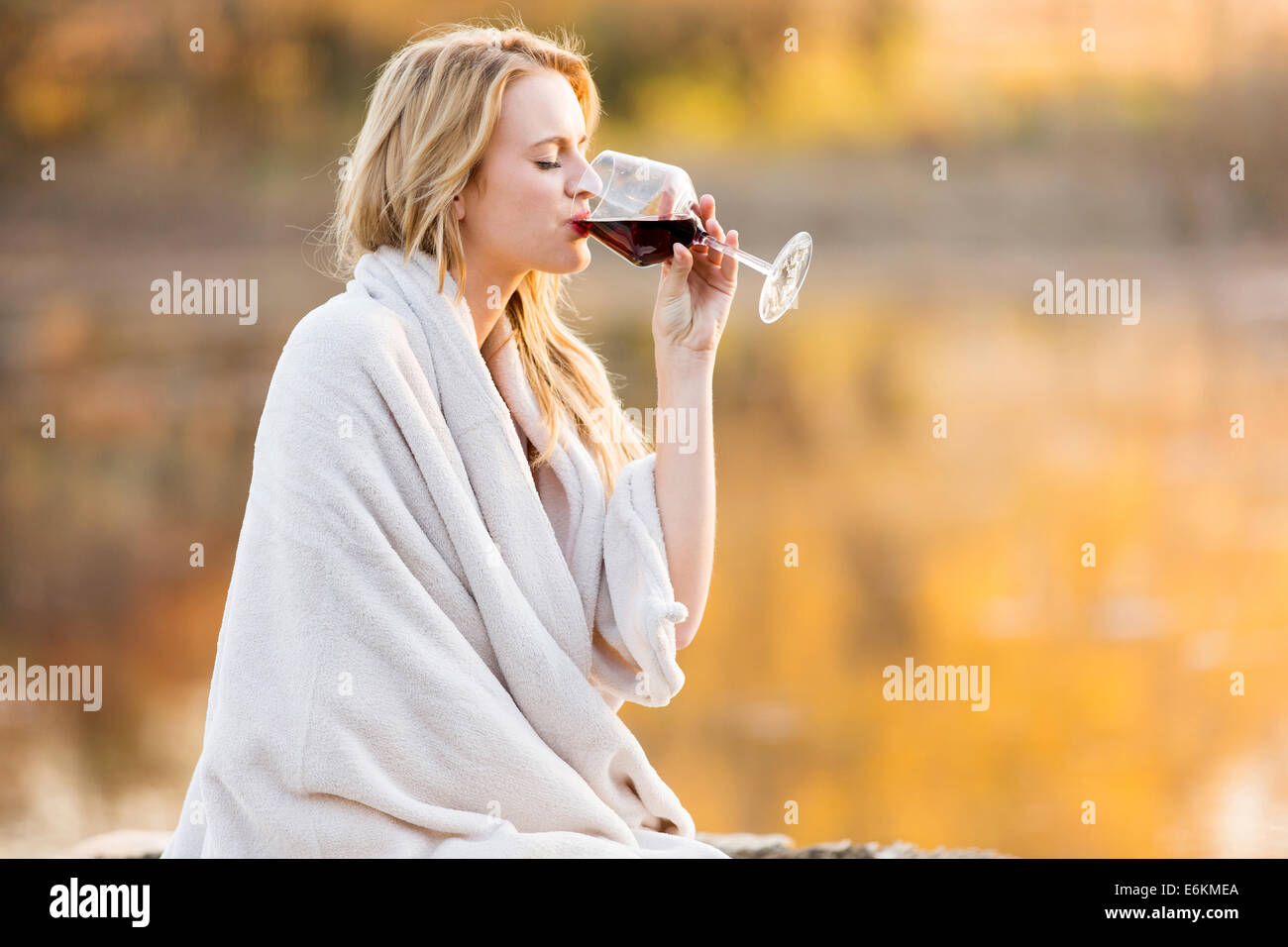 Attractive woman drinking wine outside hi-res stock photography and ...