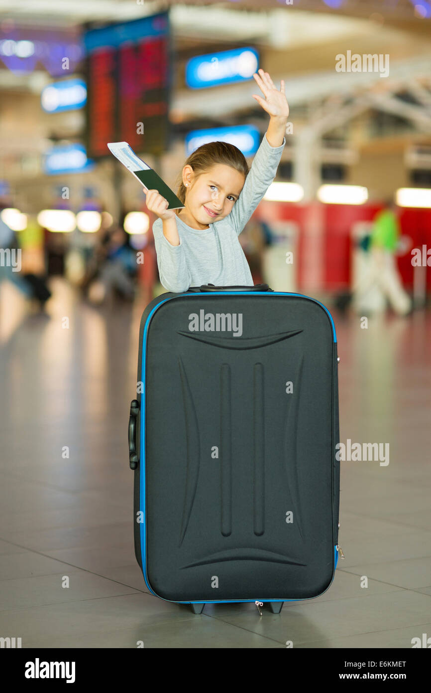 Girl waving goodbye hi-res stock photography and images - Alamy