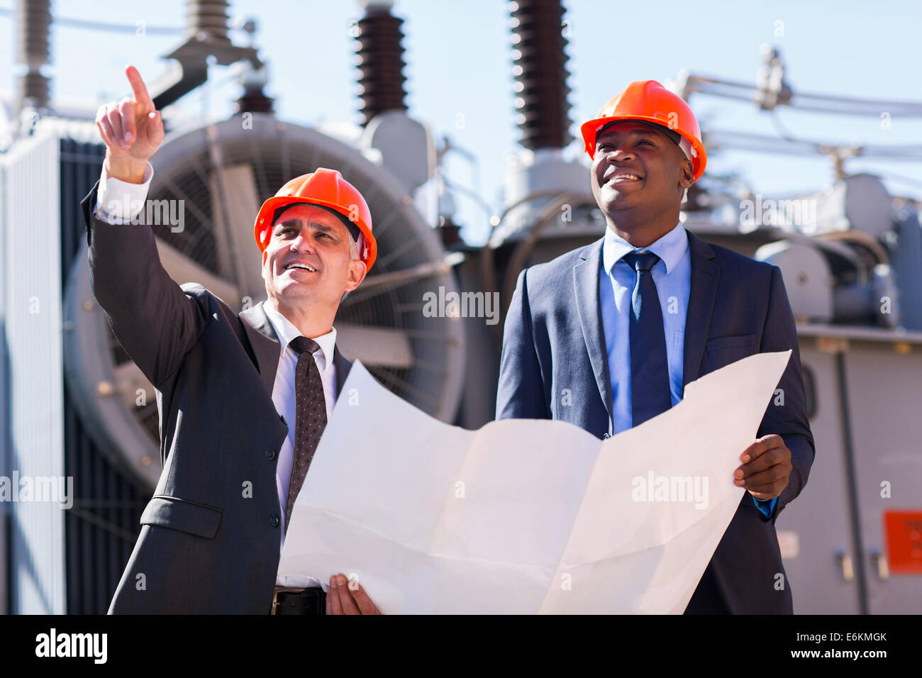 professional managers working in electrical substation Stock Photo - Alamy