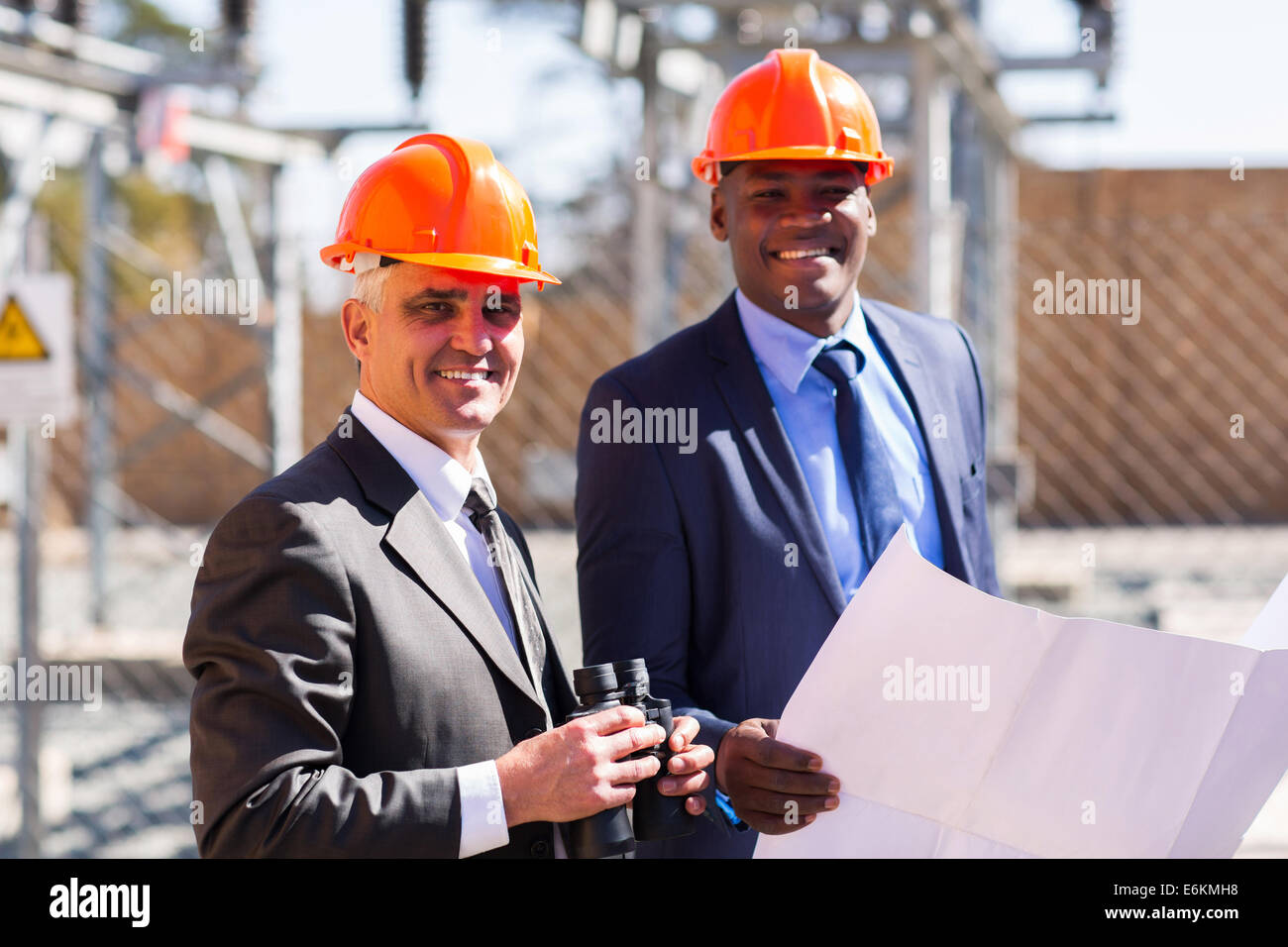 two electrical managers in power plant Stock Photo - Alamy