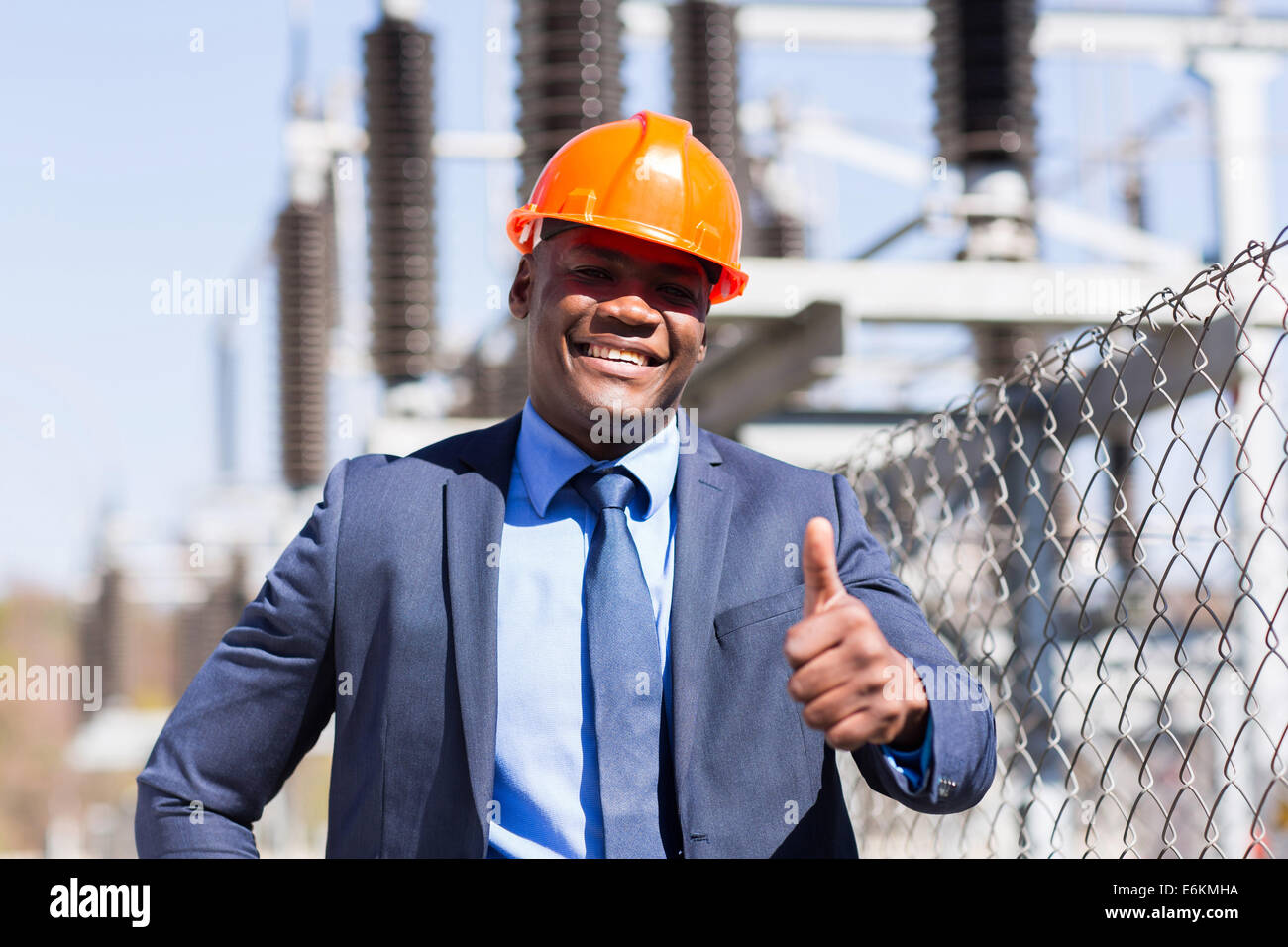 handsome African American electrical manager giving thumb up Stock ...