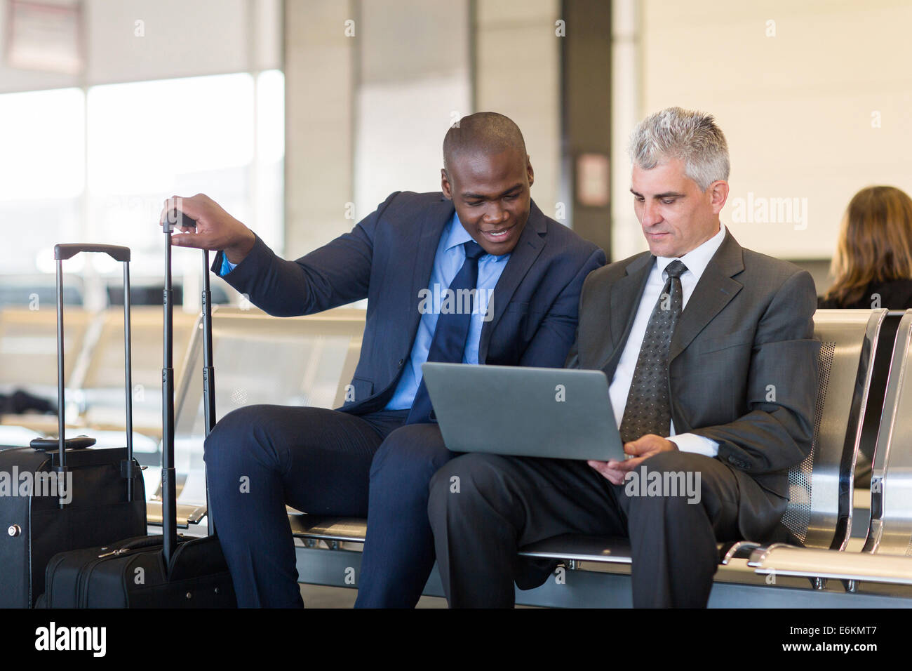 Businessman airport computer suitcase hi-res stock photography and ...