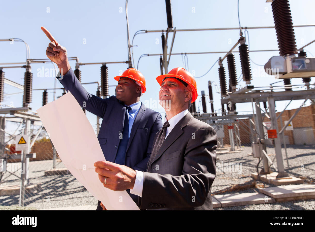 two inspectors working together in electrical substation Stock Photo ...