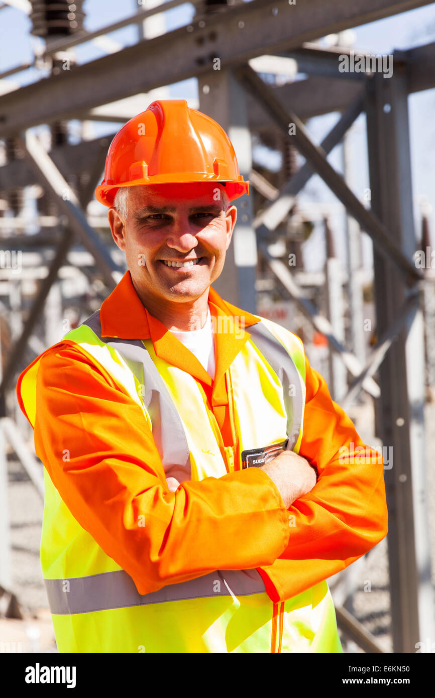 portrait of happy senior electrical engineer in substation Stock Photo ...