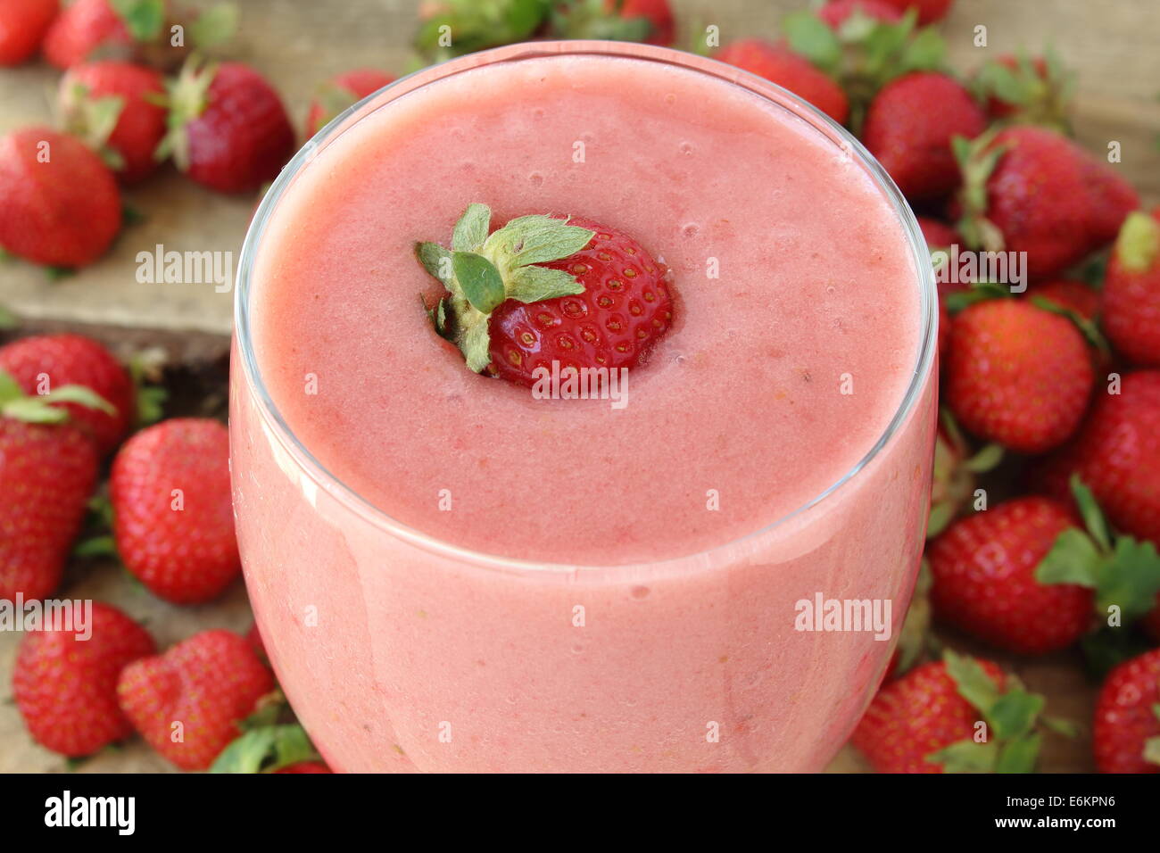 Pink smoothie made with strawberries Stock Photo - Alamy