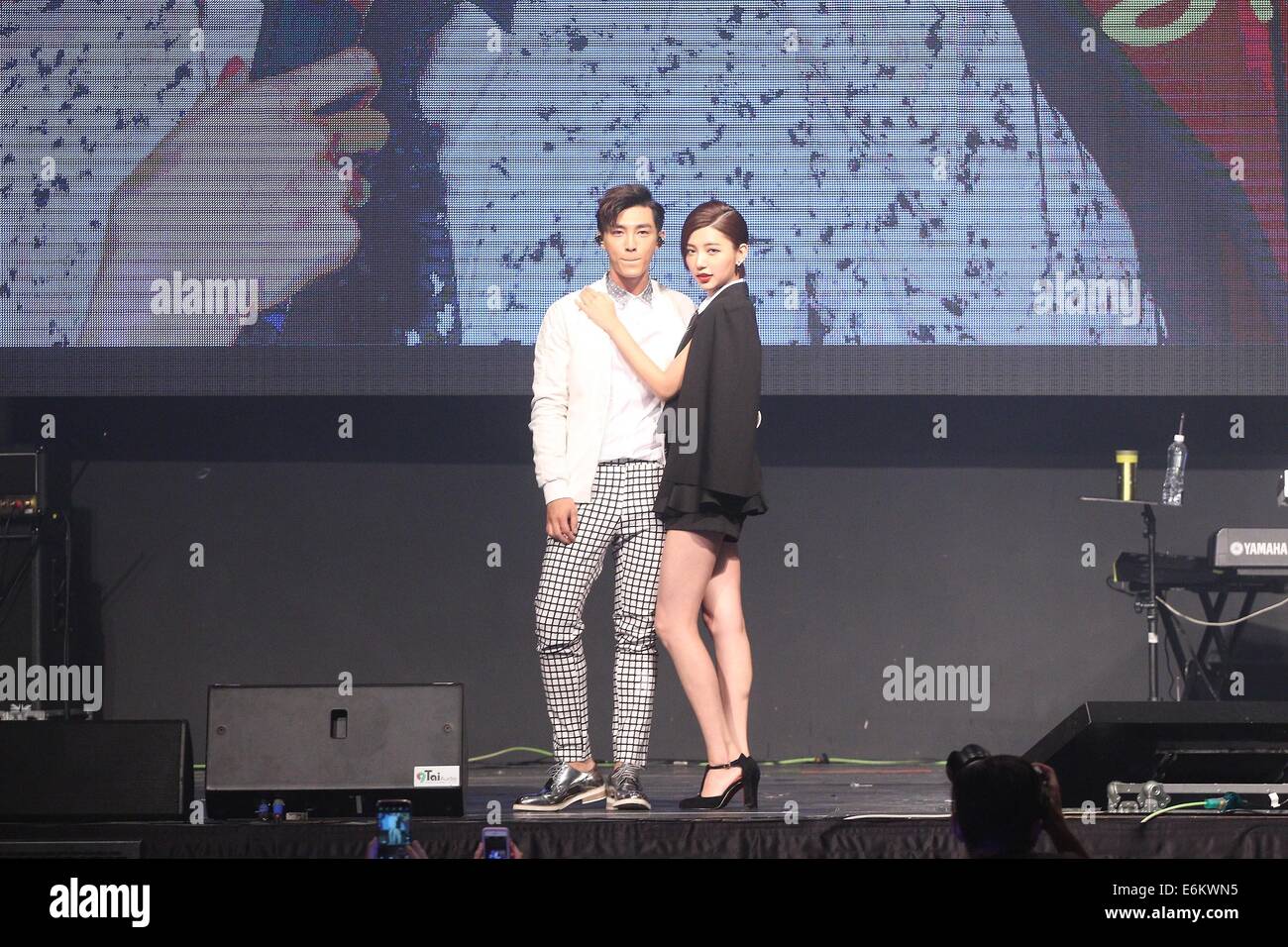 Taipei. 24th Aug, 2014. Singer Aaron Yan of Fahrenheit and actress Puff ...
