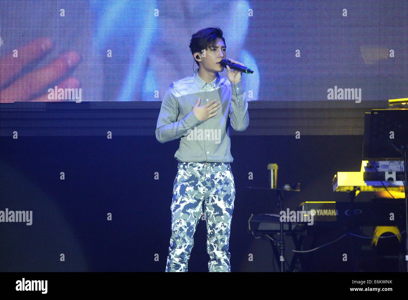 Taipei. 24th Aug, 2014. Singer Aaron Yan of Fahrenheit performs on ...
