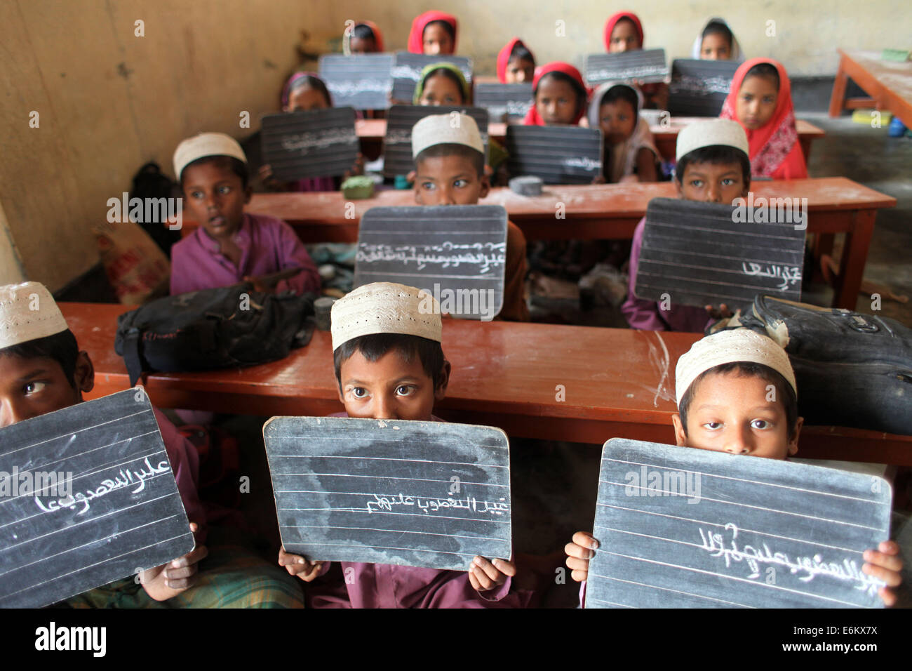 Dhaka, Bangladesh. 9th Sep, 2014. Bangladeshi students display their ...