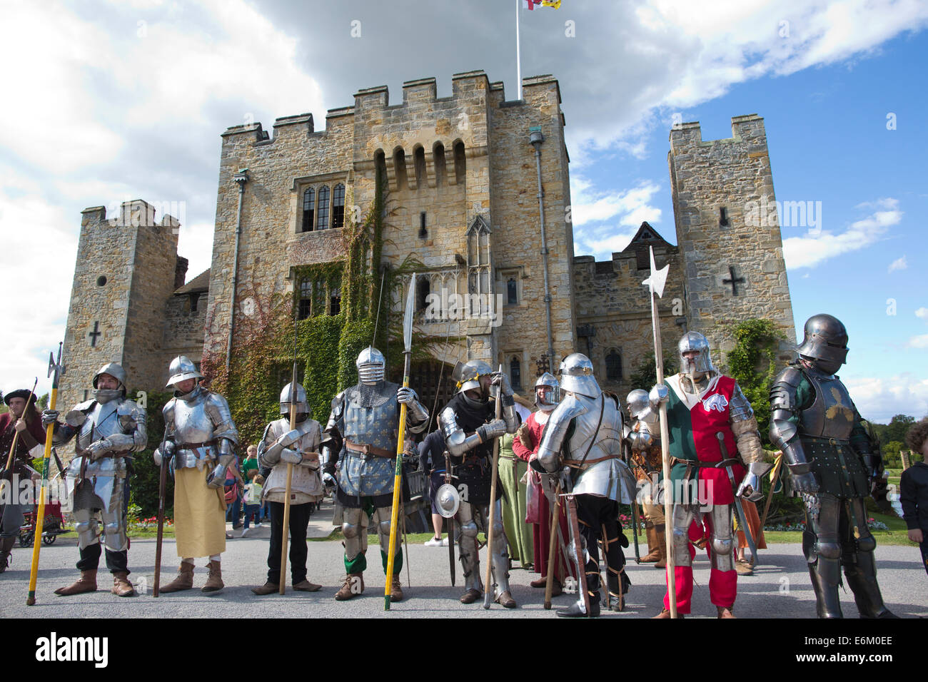 Tudor Knights in armour in front of the entrance to Hever Castle, near ...