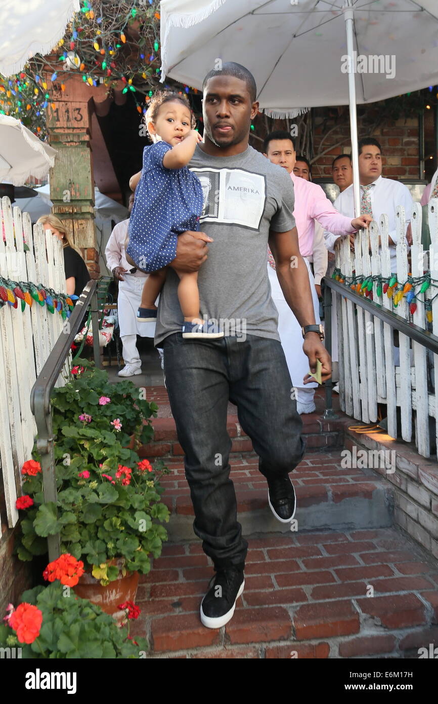 Reggie Bush and partner Lilit Avagyan with their daughter Briseis seen ...