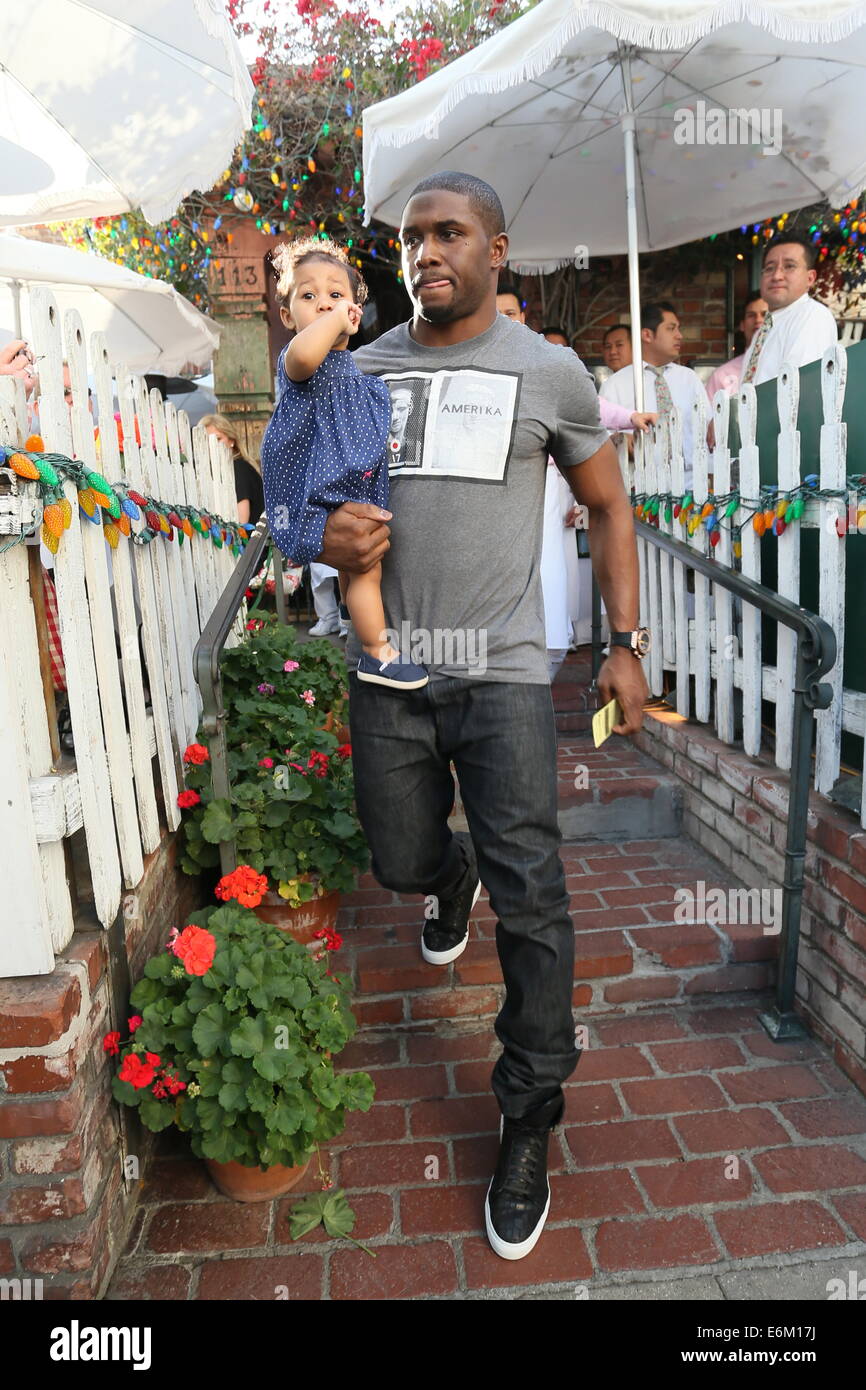 Reggie Bush and partner Lilit Avagyan with their daughter Briseis seen ...