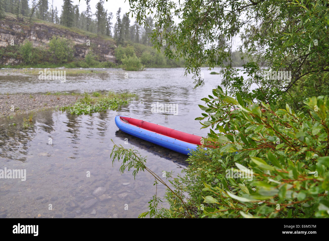 Tourist boat on the North taiga mountain river in the area of the Polar ...