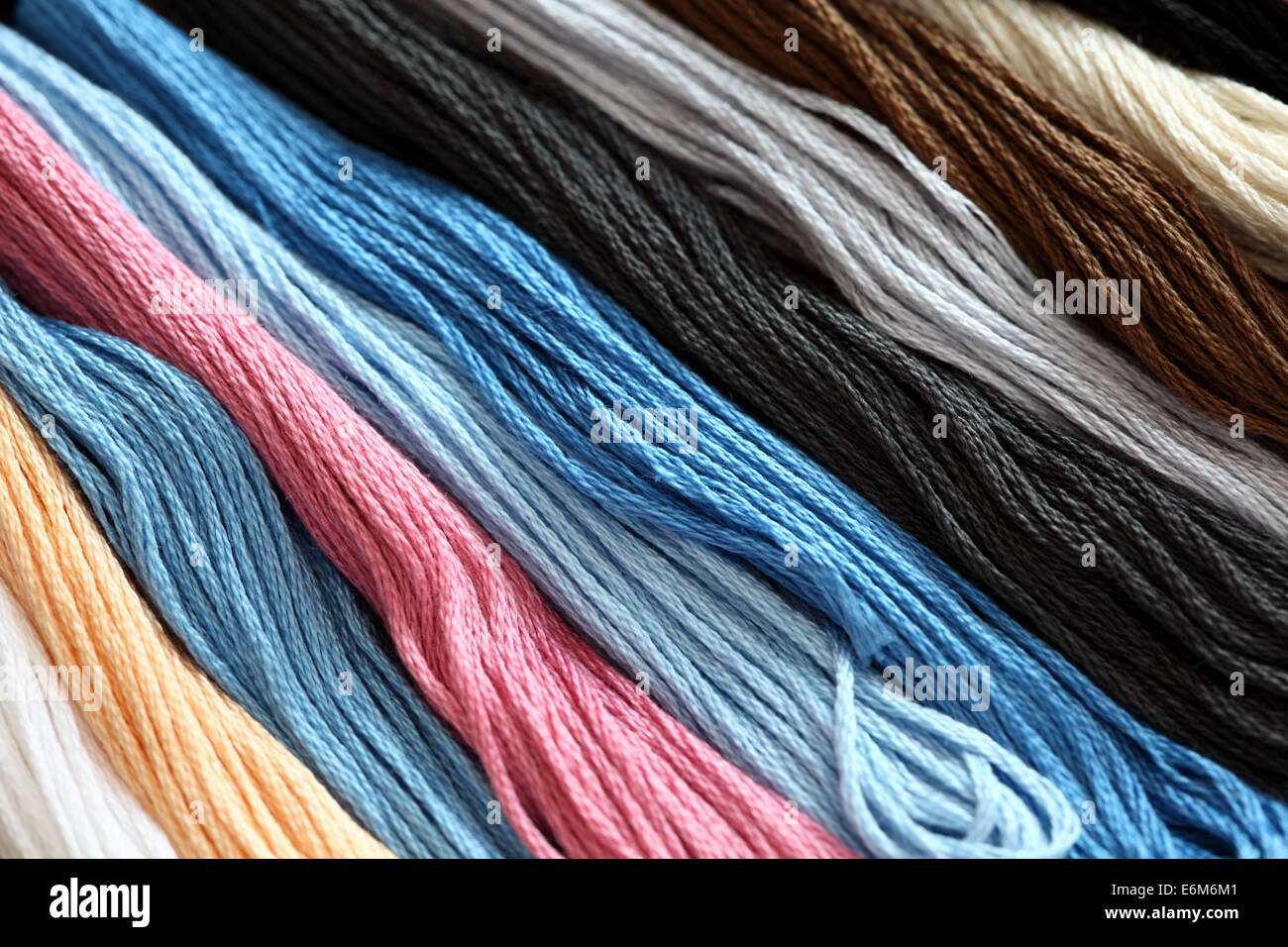 Cross-Stitch threads background. Closeup Stock Photo - Alamy