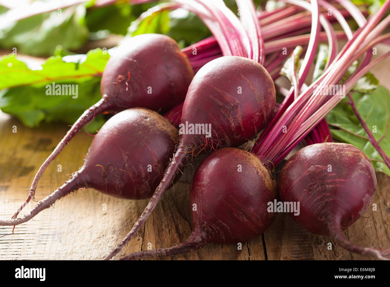 fresh beetroot on wooden background Stock Photo - Alamy