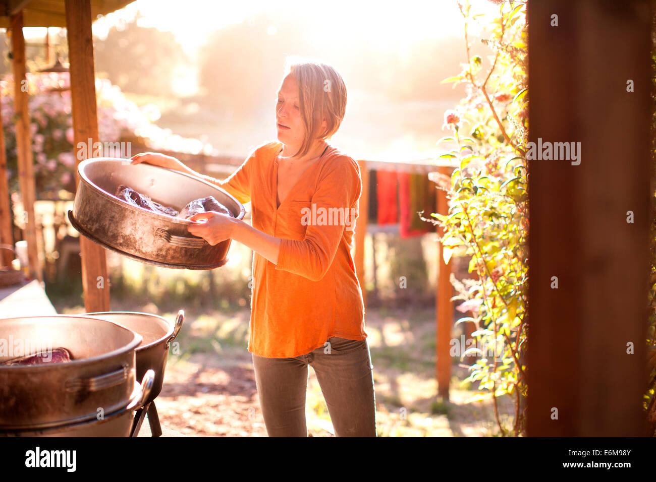 Woman dying yarn Stock Photo - Alamy