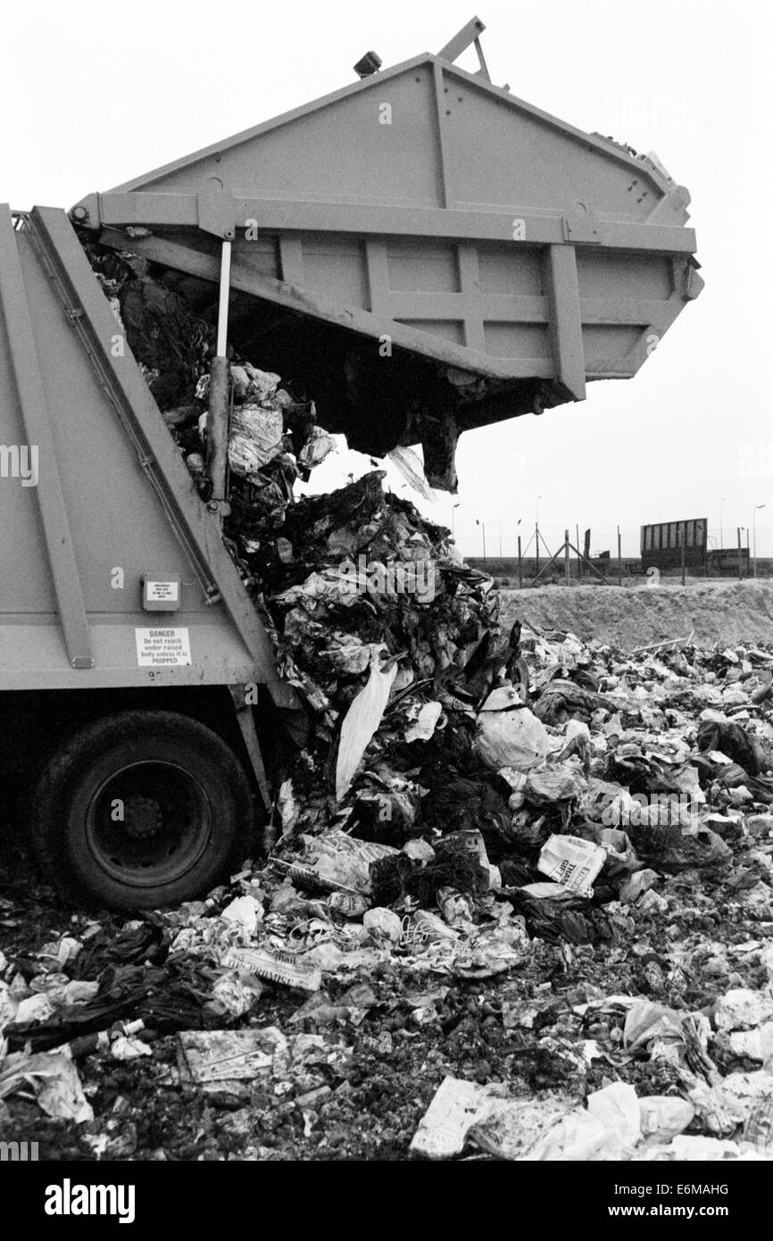 mounds of garbage at a landfill site in the 1990s which is now buried ...