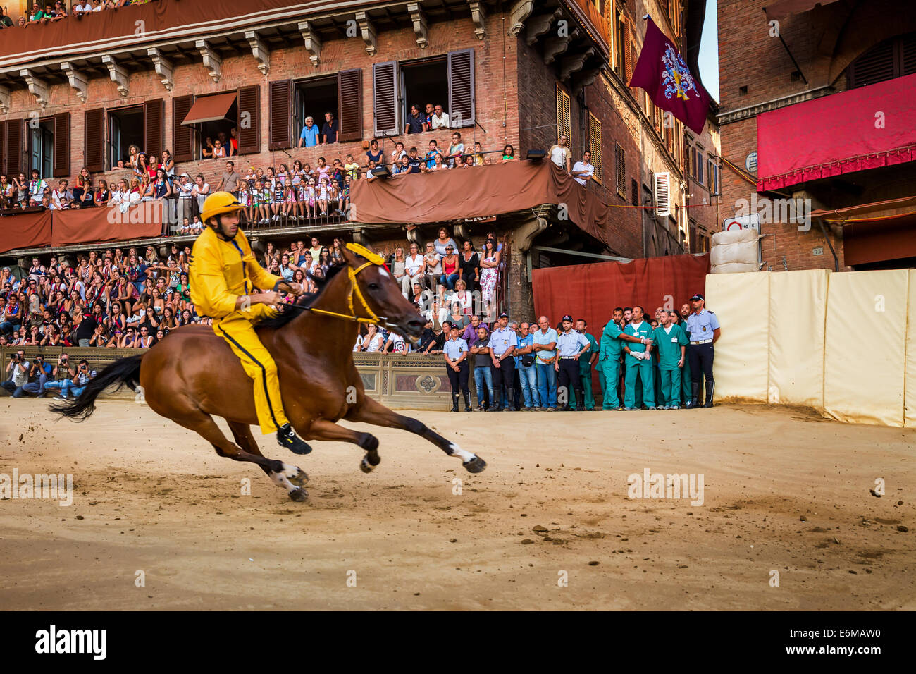 The Palio di Siena horse race on Piazza del Campo, Siena, Tuscany ...