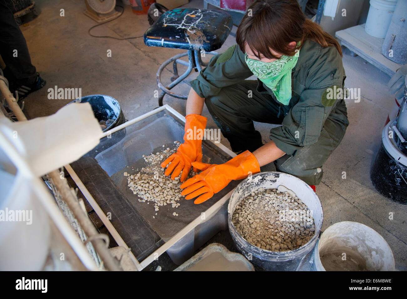 Woman working in shed Stock Photo - Alamy