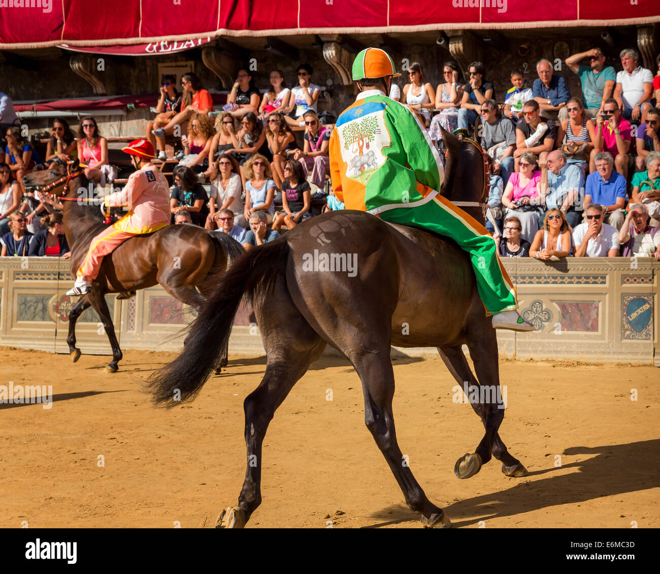 Jockeys waiting for the start of Palio di Siena horse race on Piazza ...