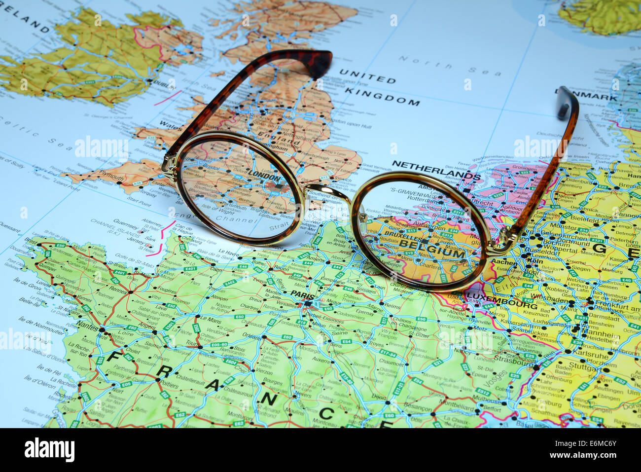 Glasses on a map of europe - Brussels Stock Photo - Alamy