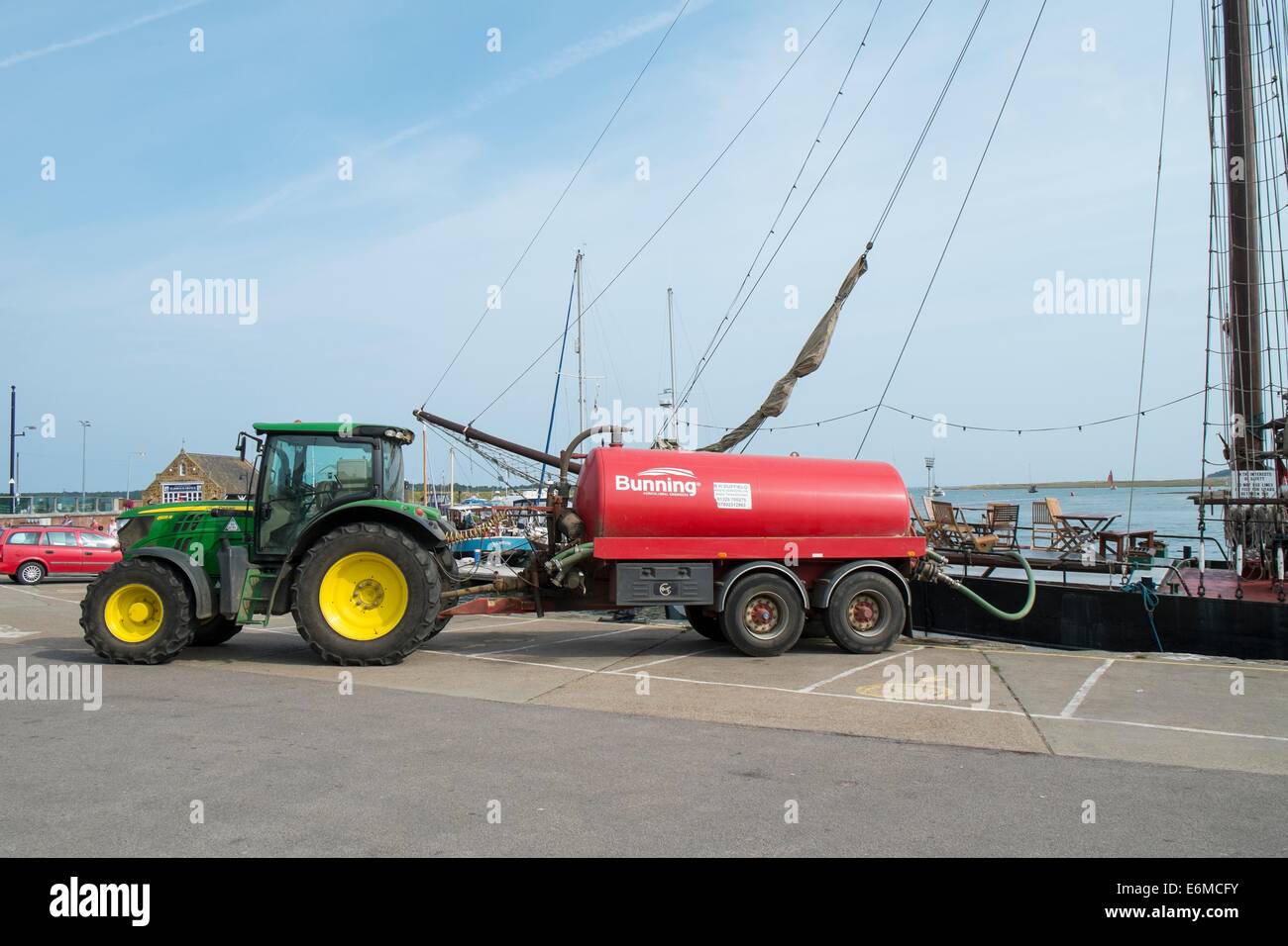 Contractor pumping effluent from moored sailing ship 'Albatross', Wells ...