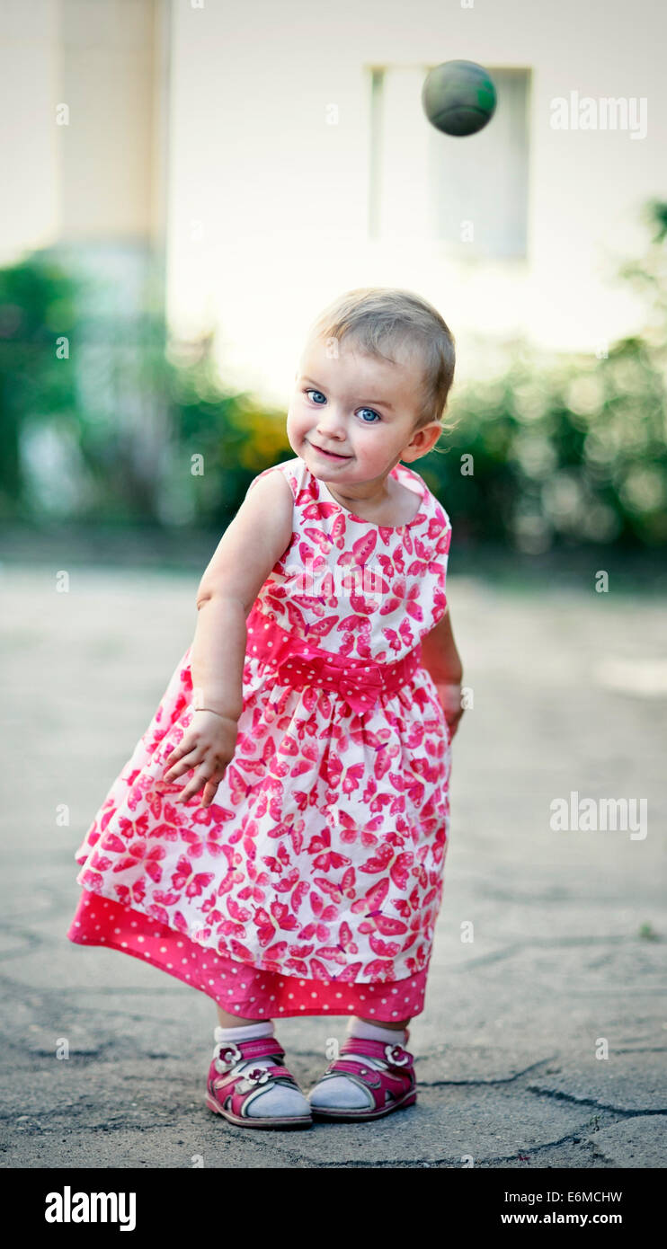 Girl throw ball hi-res stock photography and images - Alamy