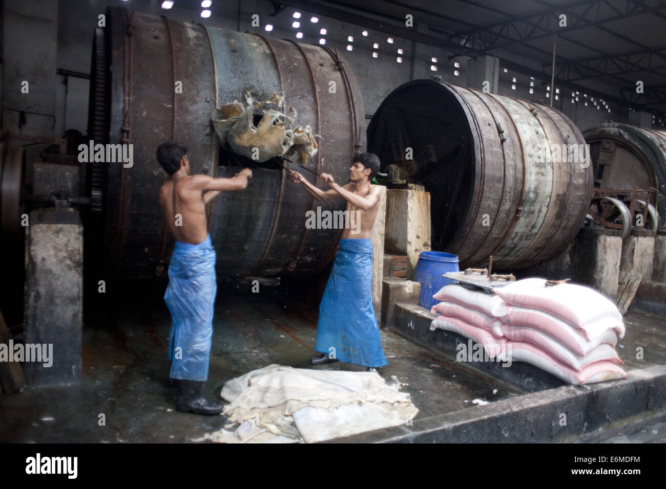 Dhaka, Bangladesh. 26th Aug, 2014. Bangladeshi tannery workers process ...