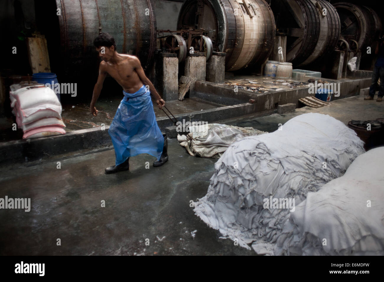 Dhaka, Bangladesh. 26th Aug, 2014. Bangladeshi tannery workers process ...